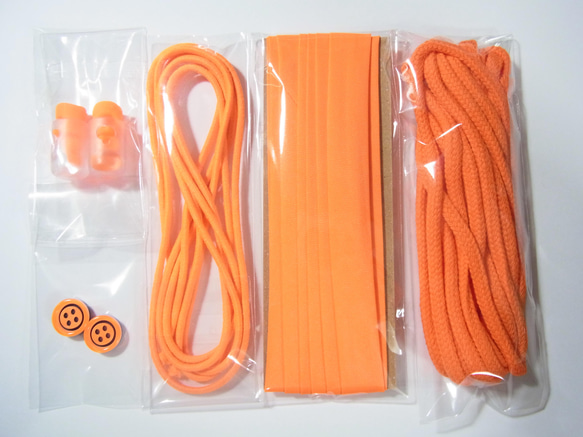 ネオンカラー 蛍光色 オレンジ系5点セット 両折バイアステープ、スピンドル、ストレッチコード、コードストッパー、ボタン ひも・コード ロング ...