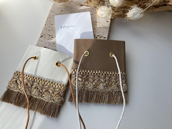 レザーフリンジラップポニー ポニーフック・ヘアカフス bloom. 通販｜Creema(クリーマ)