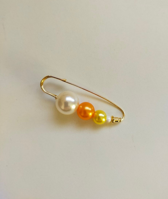 ストールピン オレンジ② ブローチ まいん 通販｜Creema(クリーマ) 15062038