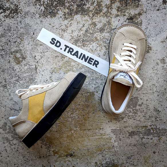 SD.Trainer ベージュ×マスタード スニーカー ふじや靴店 通販 16402716｜Creema(クリーマ)