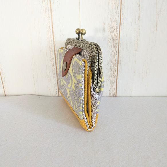 （再販・¥5500）ミナペルホネン jungle relief(yellow) シンプルがま口二つ折り財布 二つ折り財布 mottey 通販 16911307｜Creema(クリーマ)