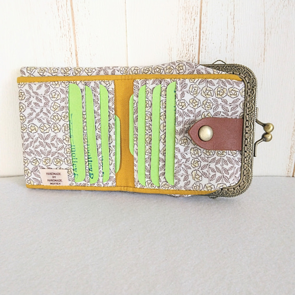 （再販・¥5500）ミナペルホネン jungle relief(yellow) シンプルがま口二つ折り財布 二つ折り財布 mottey 通販 16911307｜Creema(クリーマ)