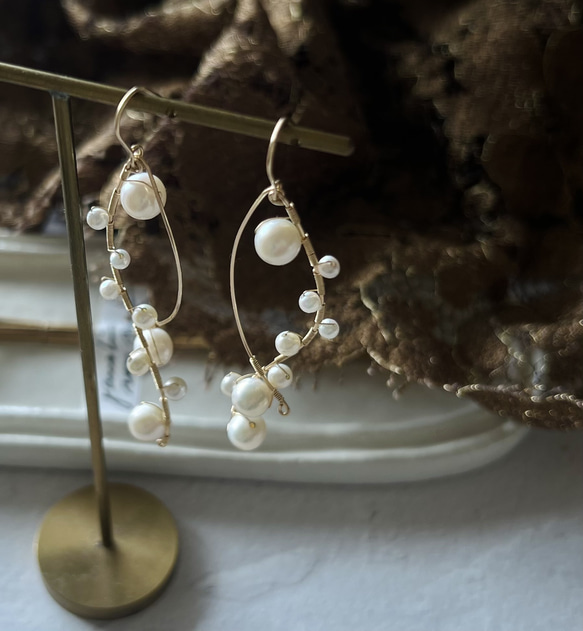 【特集掲載】【再販】ウェーブピアス／イヤリング【淡水パール】14kgf 6月誕生石 フォーマル ピアス（フック・チェーン） makila 通販 18908893｜Creema(クリーマ)