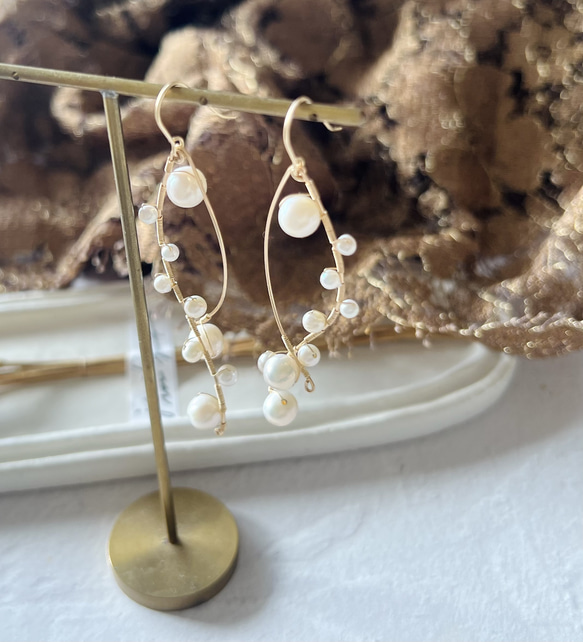 【特集掲載】【再販】ウェーブピアス／イヤリング【淡水パール】14kgf 6月誕生石 フォーマル ピアス（フック・チェーン） makila 通販 18908893｜Creema(クリーマ)