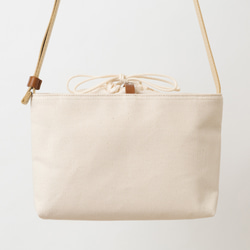 巾着帆布サコッシュ／フロントポケットがカーブver【生成り】 ショルダーバッグ satoka 通販 19290771｜Creema(クリーマ)