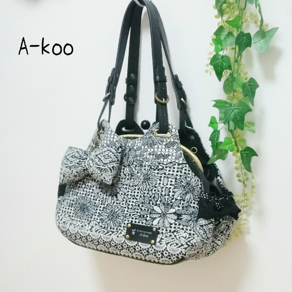 シックなレース☆ジャガードニット(黒)☆あおり付きがま口バッグ がま口 A-koo 通販 3065685｜Creema(クリーマ)