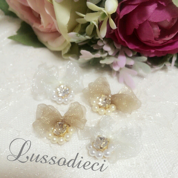 mona*結婚式*二次会*パーティー*スワロフスキー*オーガンジーリボン*パール ピアス（その他） lussodieci 通販｜Creema ...