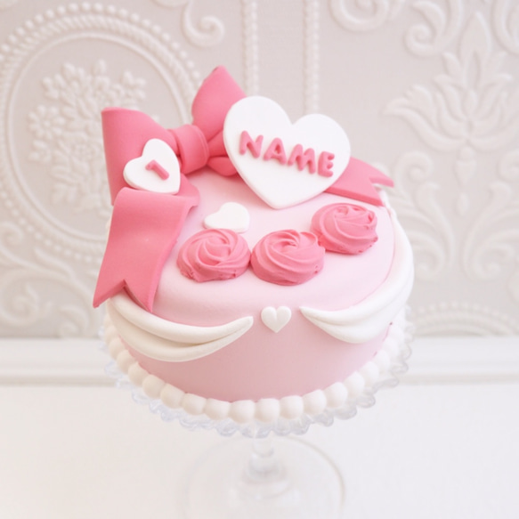 ラブリーリボンのクレイケーキ ︎色変更可＊フェイクケーキ＊推しケーキ＊バースデー＊センイルケーキ その他置物 Marry Clay〜マリー ...