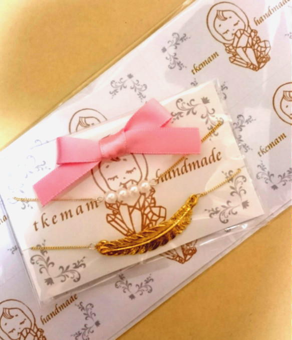 再販！フェザーとパールの二連ブレスレット ブレスレット tkemam_handmade 通販｜Creema(クリーマ) 1351087