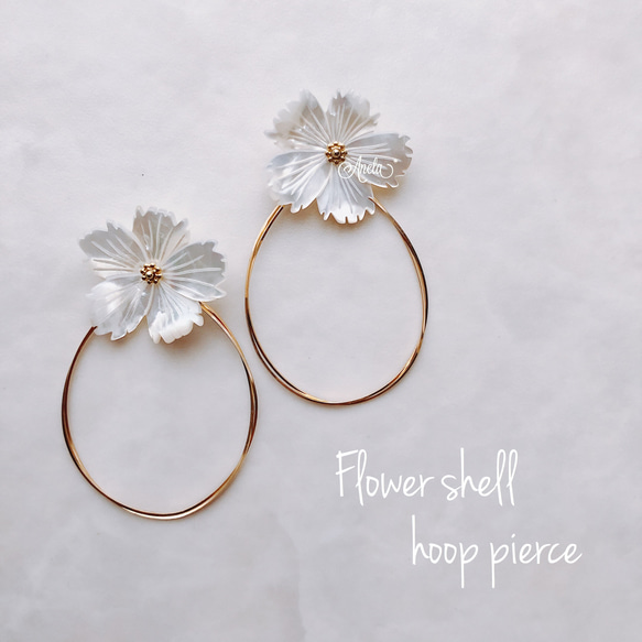 Big flower shell hoop ピアス（フック・チェーン） Anela* 通販｜Creema(クリーマ) 6975047